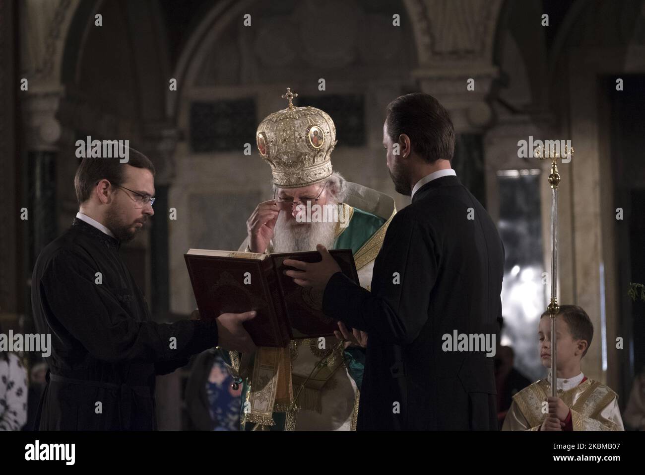 Patriarch Neophyte reads the liturgy during Palm Sunday Mass at St ...