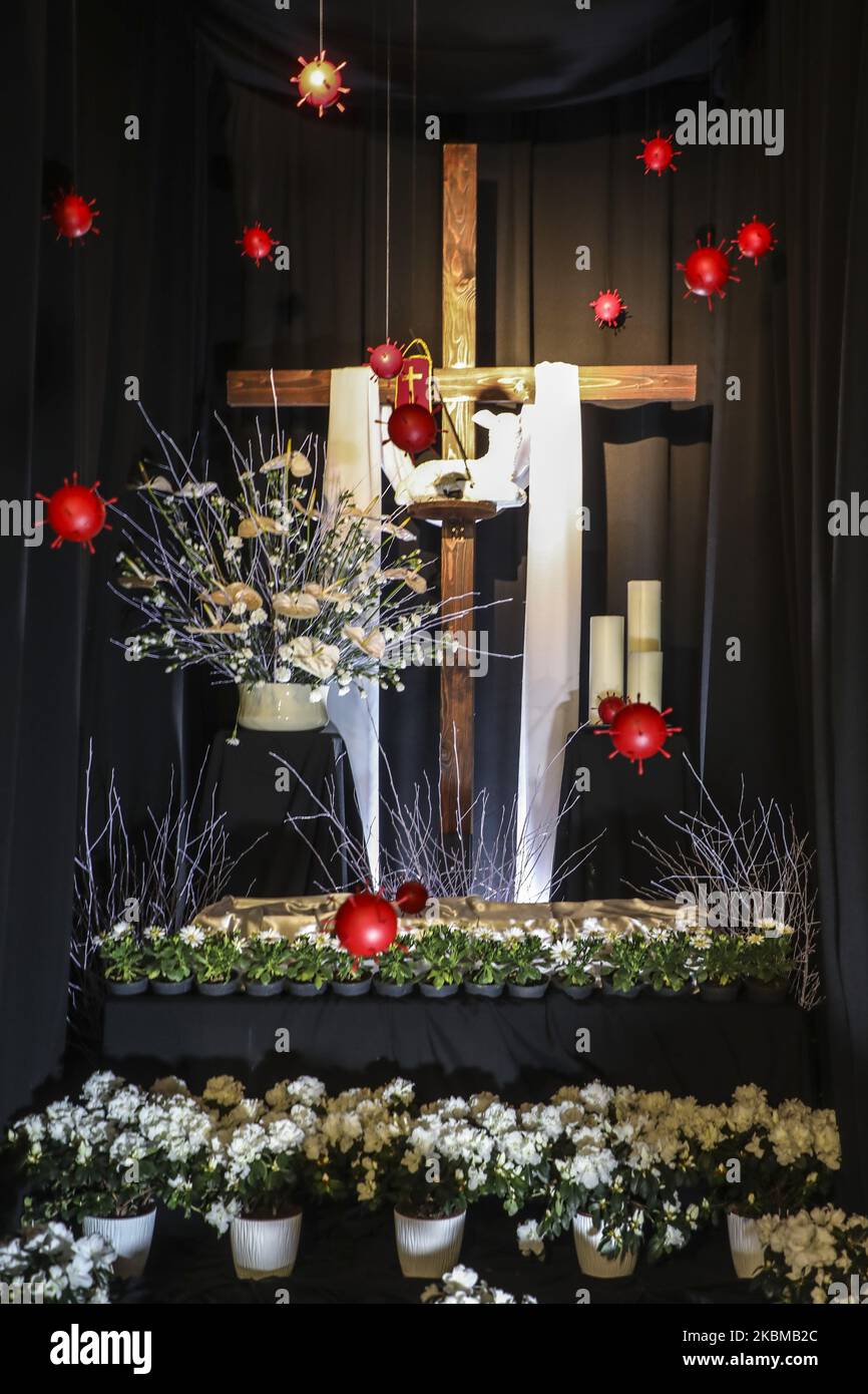 An empty tomb of Christ with the theme of coronavirus is pictured ...