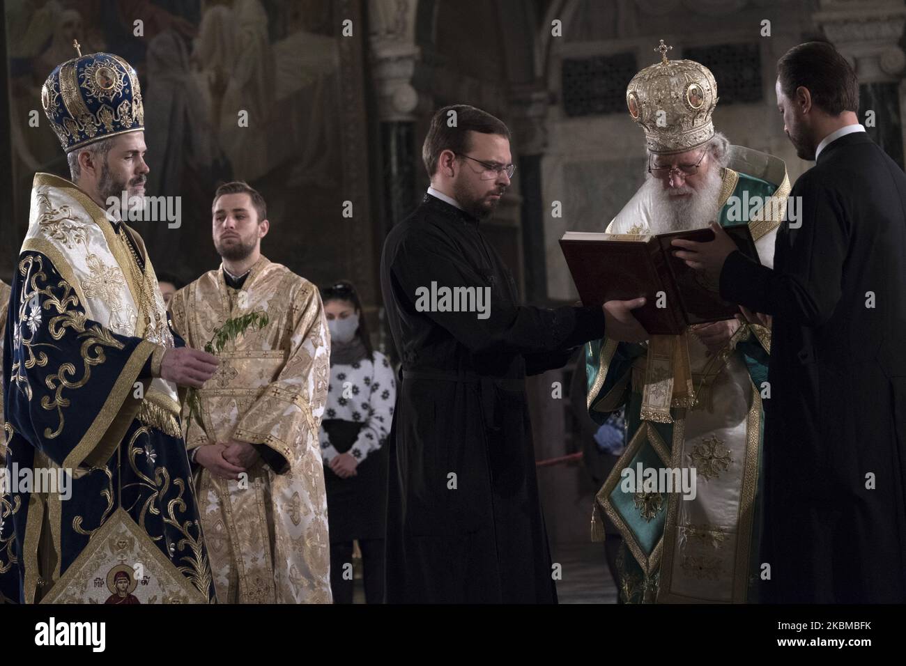 Patriarch Neophyte reads the liturgy during Palm Sunday Mass at St ...