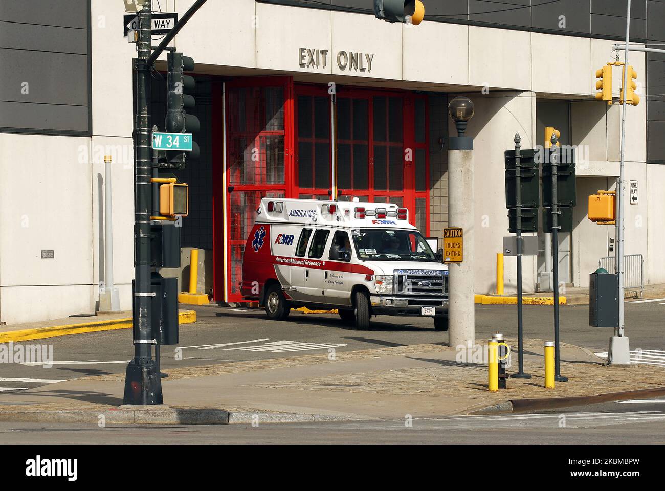 An ambulance exits Jacob Javits Convention Center, in New York, United ...