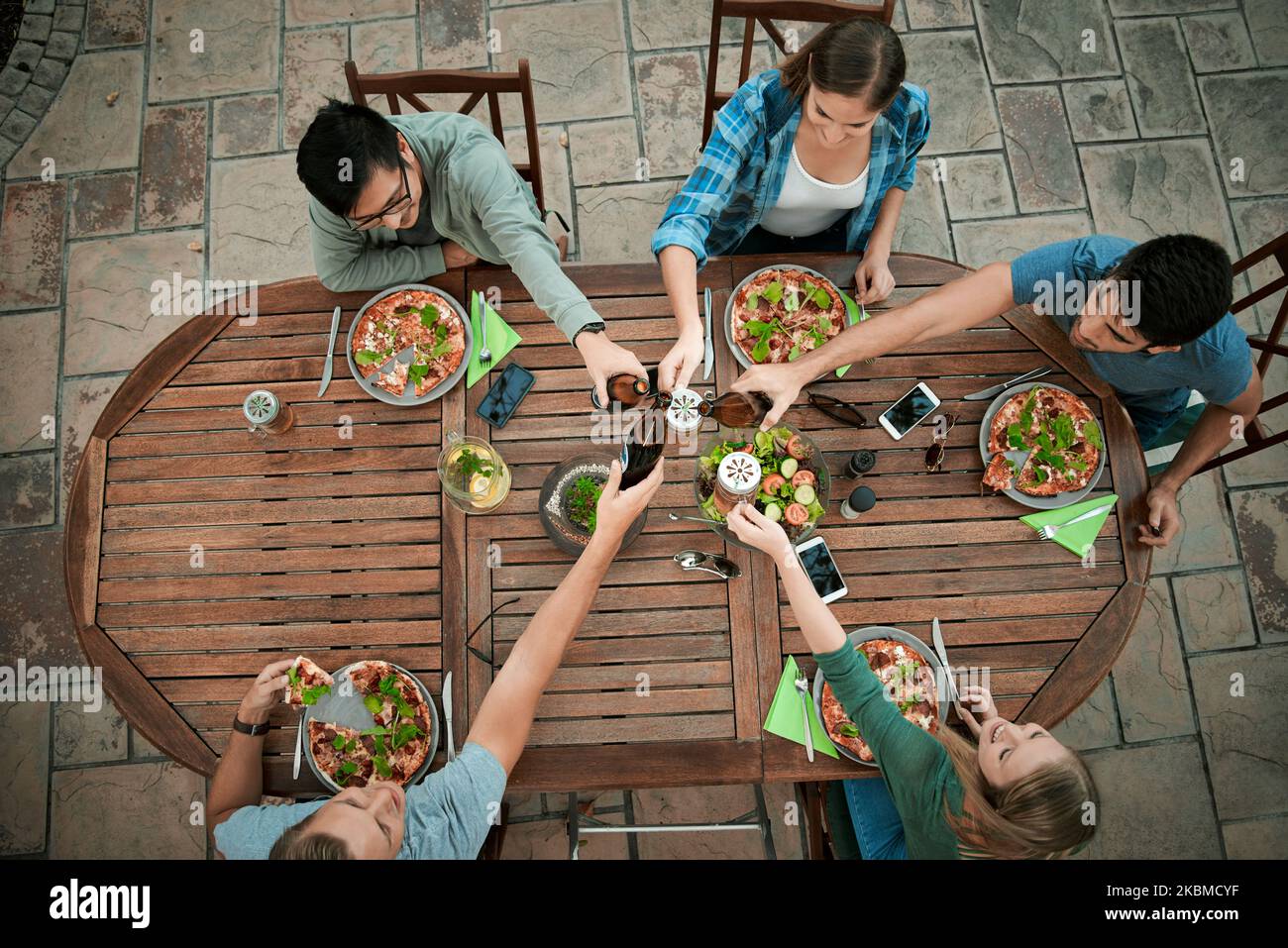 We are a circle of friends. High angle shot of a group young friends ...