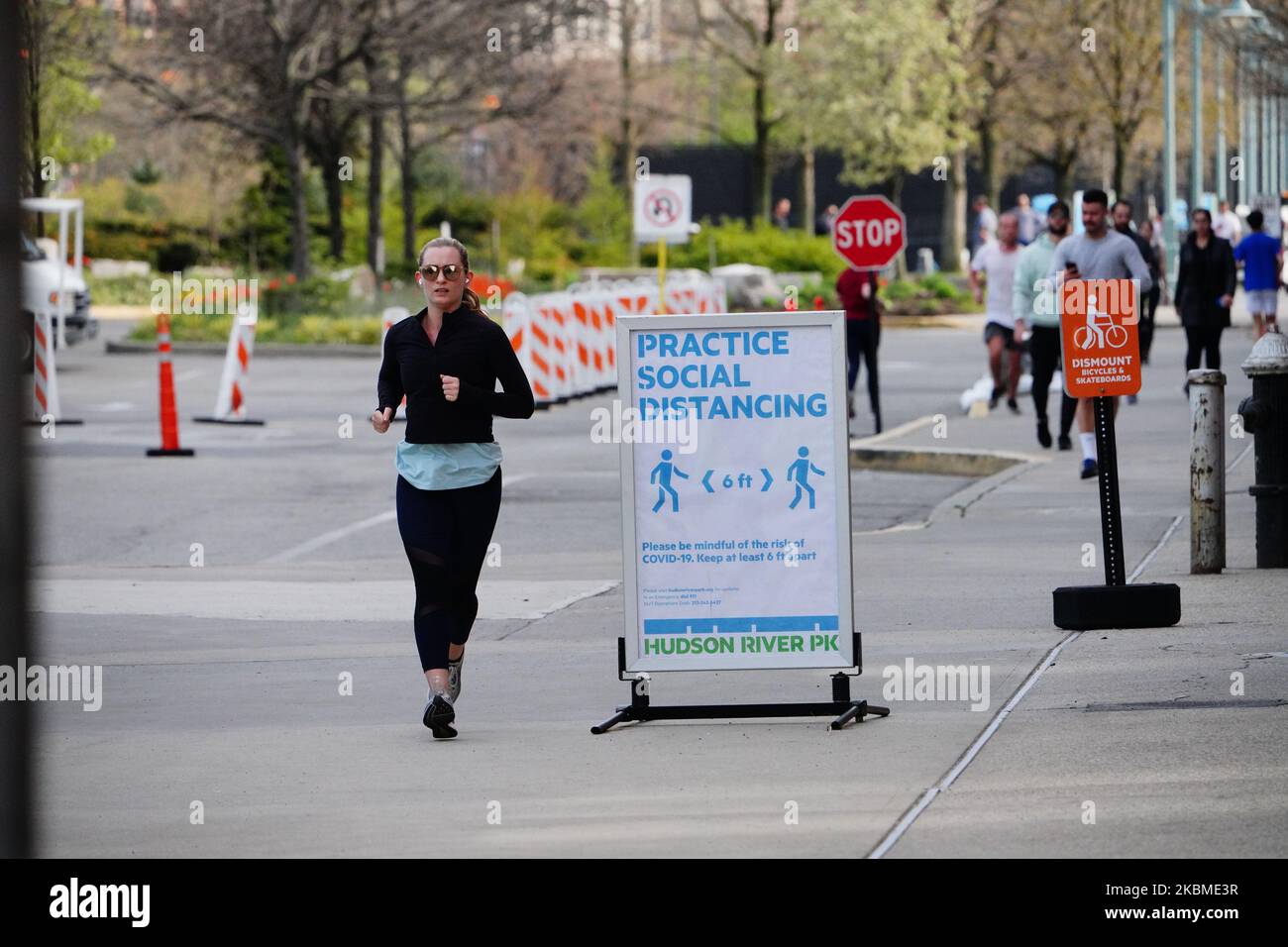 A view of people exercising in Hudson River Park in New York City USA ...