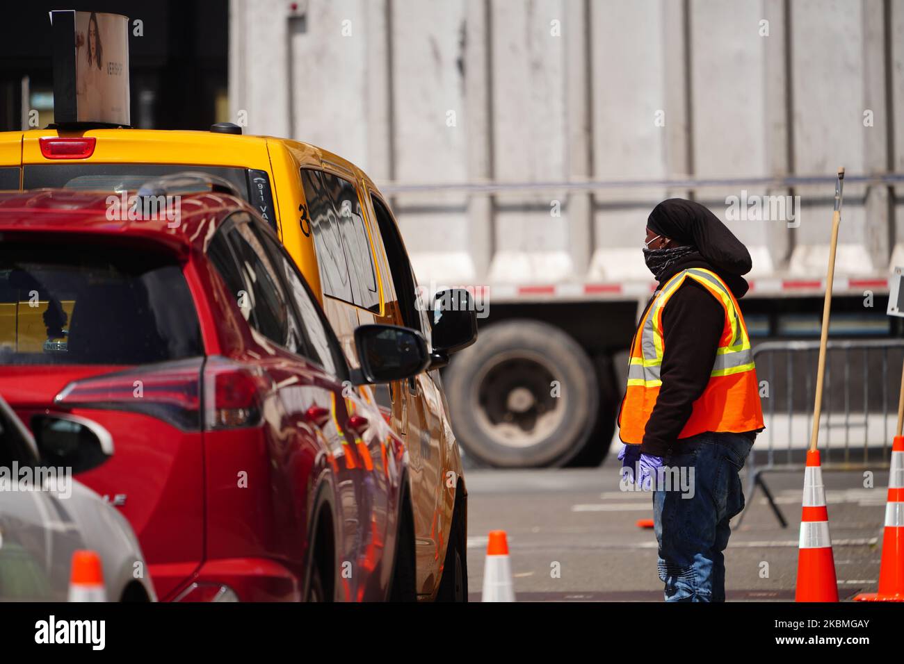 A view of New York City workers distributing relief goods at Flushing ...