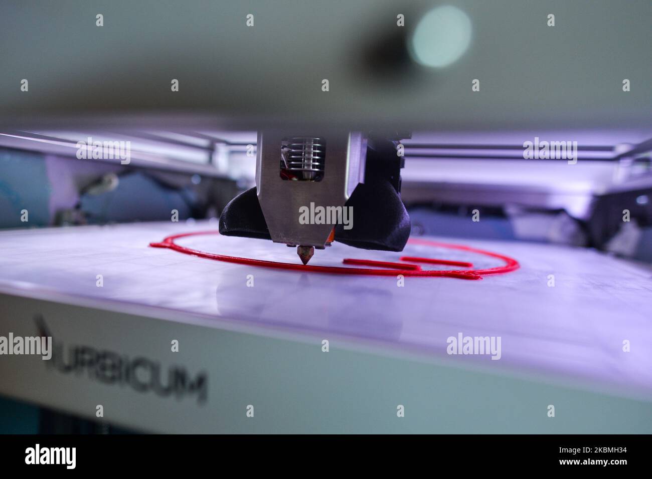 A 3D printer makes partes of the VentilAid Prototype III respirator, a ...