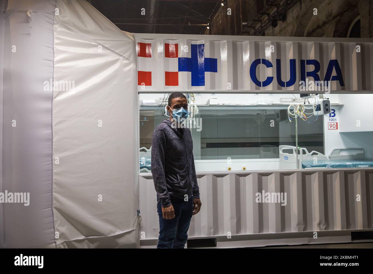 One of the Cuban Doctor pose in front of the autonomous reusable module ...