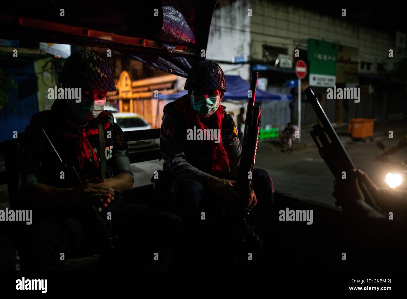 Police members wearing face masks as they patrolling on the road, amid ...