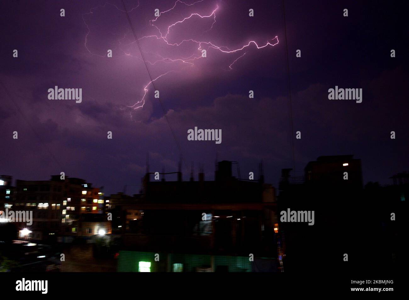 Lightning flashes in the sky over the Dhaka City during a storm in Bangladesh, on April 19, 2020 ...