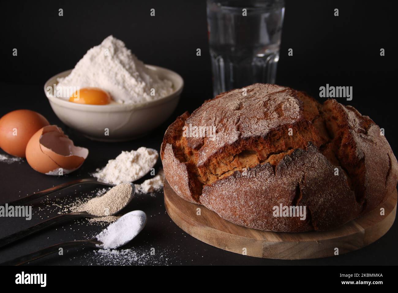 The ingredients for making bread are next to the finished bread Stock ...