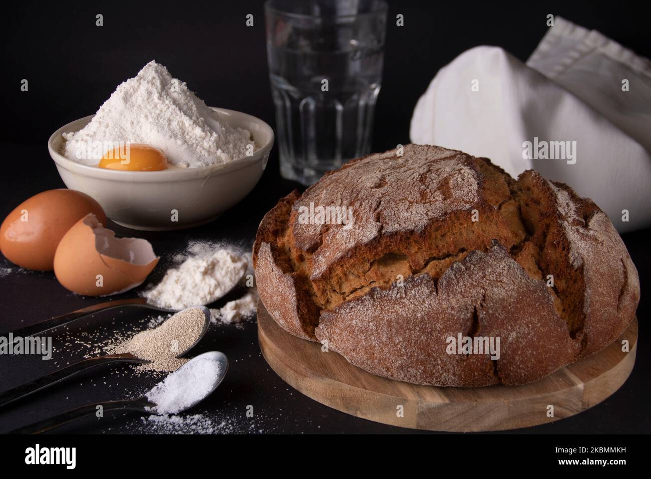 The ingredients for making bread are next to the finished bread Stock ...