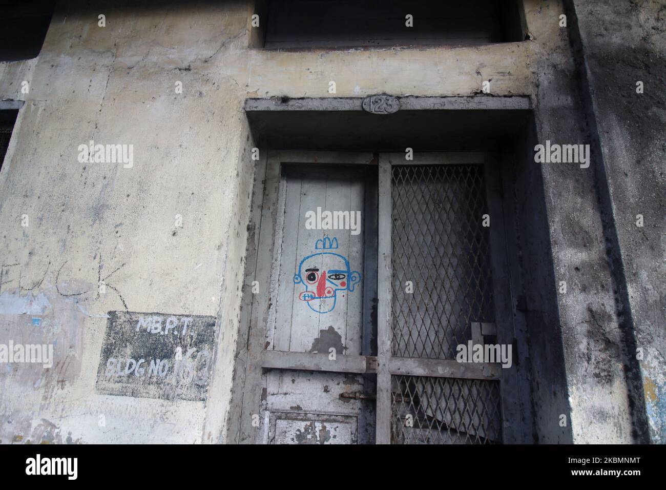 Graffiti is seen on a door of a house in Mumbai, India on April 21 ...