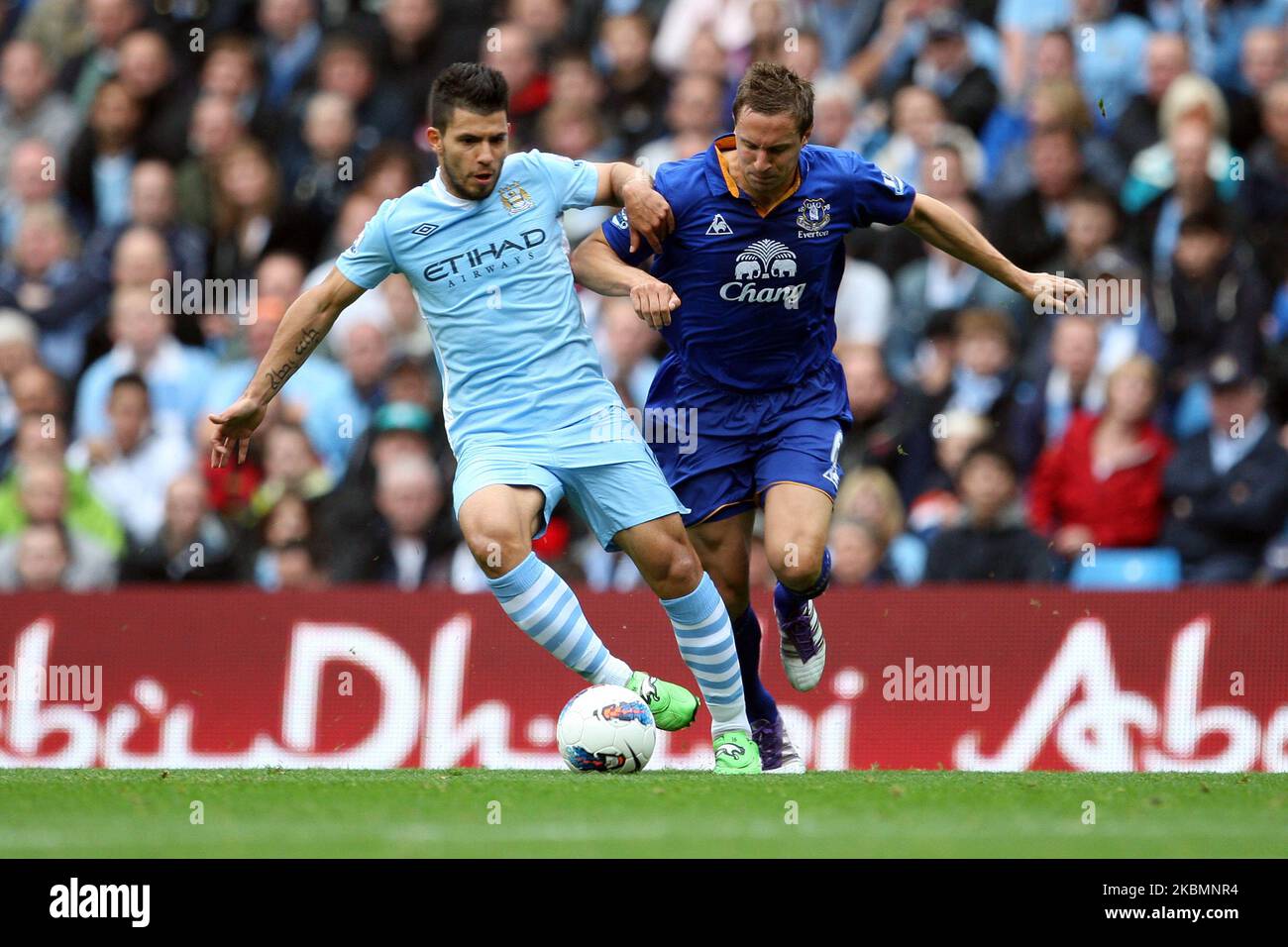 Sergio aguero of manchester city battles hi-res stock photography and ...