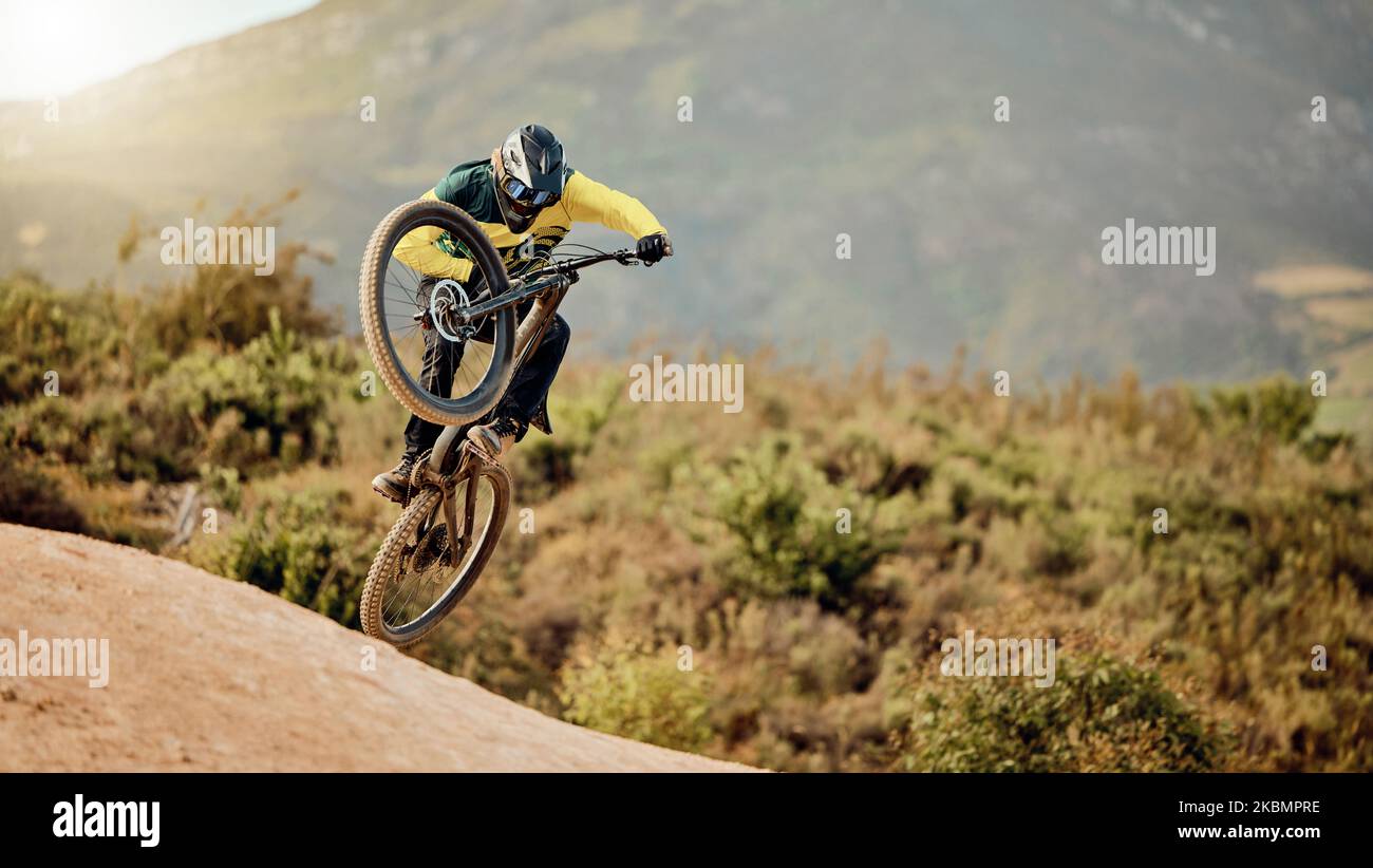 Bicycle, biker and jump in air for competition, mountain biking and ...