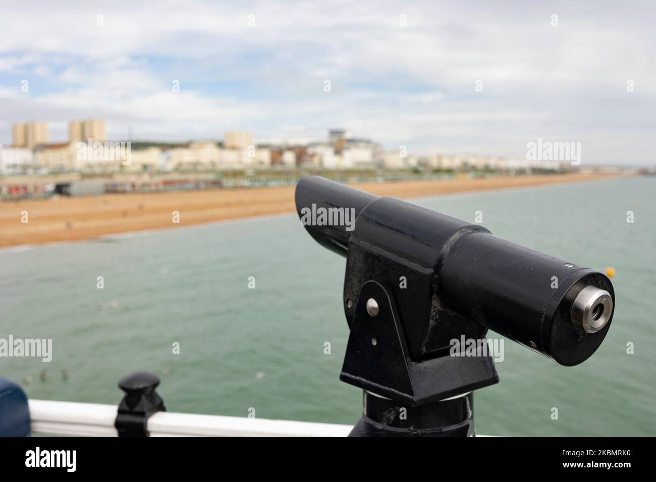 A tourist telescope or tower viewer on the sea front, reminiscent of ...