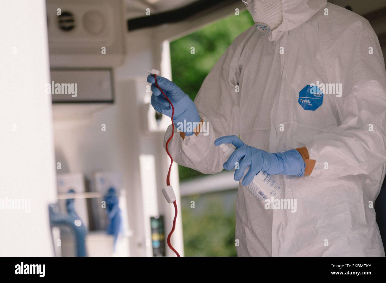 the health worker disinfect their device using for the test after ...