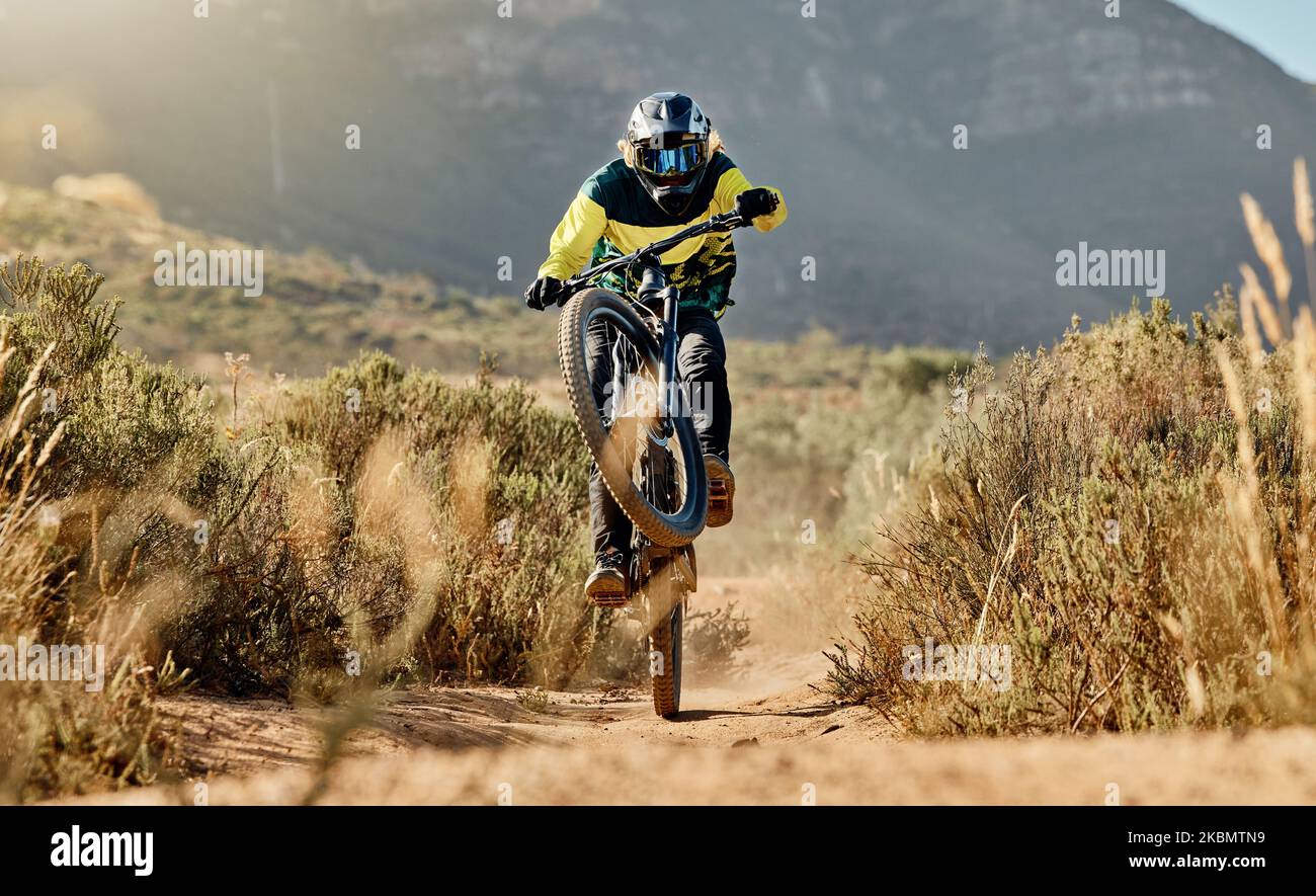 Mountain biker, dirt bike and dessert rider cycling on sports bicycle ...