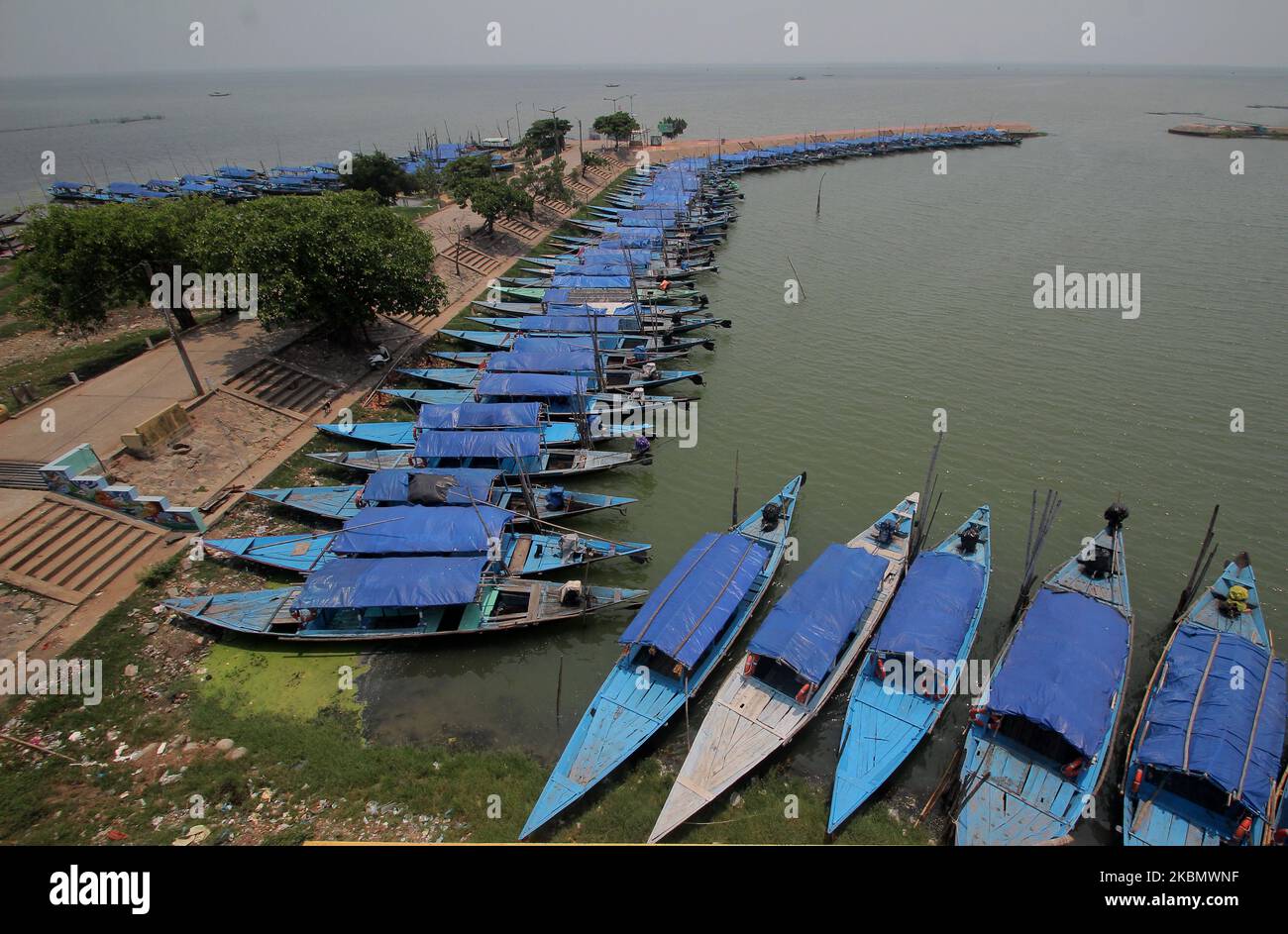 Tourist boats are seen on the bank's of Asia's biggest salt water Lake ...