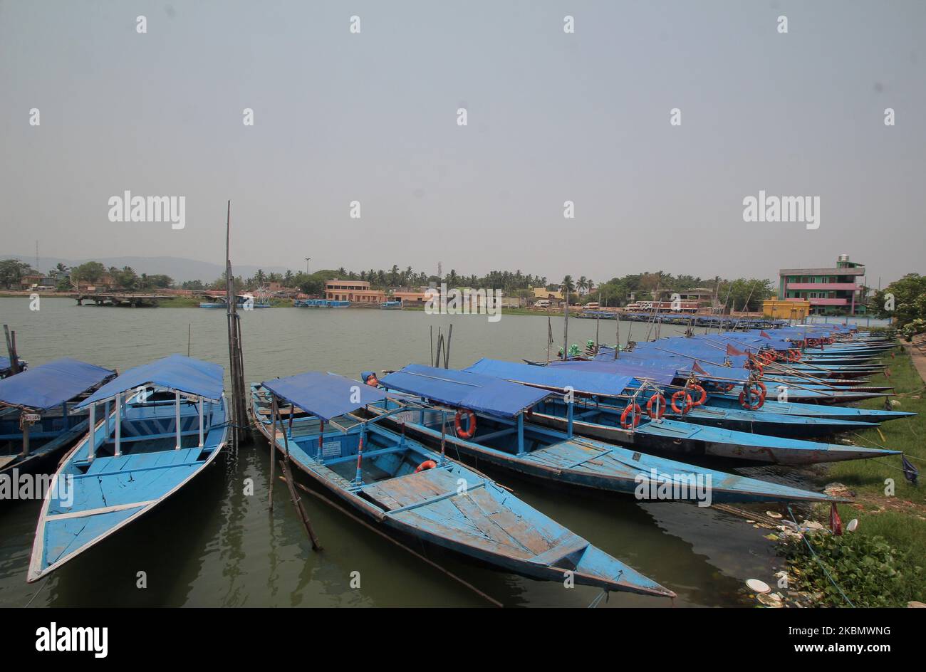 Tourist boats are seen on the bank's of Asia's biggest salt water Lake ...