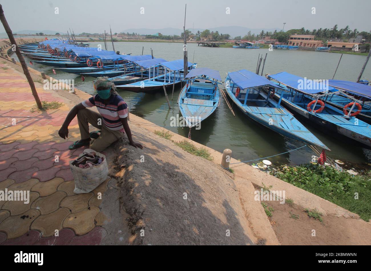 Tourist boats are seen on the bank's of Asia's biggest salt water Lake ...