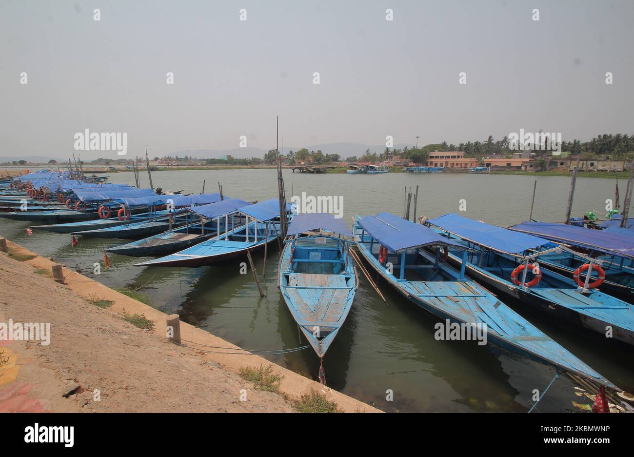 Tourist boats are seen on the bank's of Asia's biggest salt water Lake ...