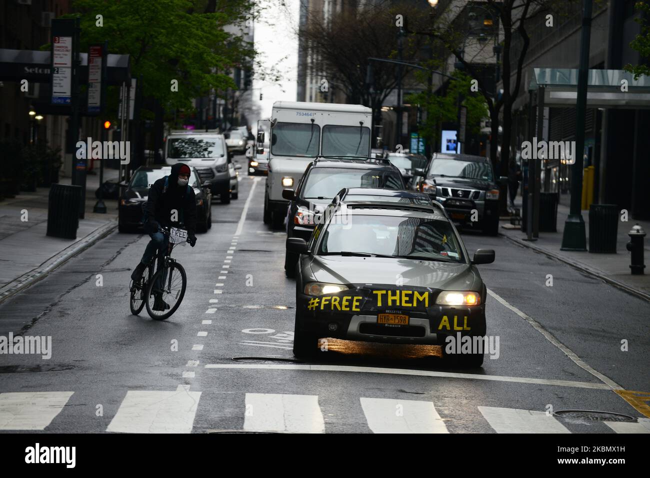 Left-wing protestors engage in a "socially distanced protest" in cars ...