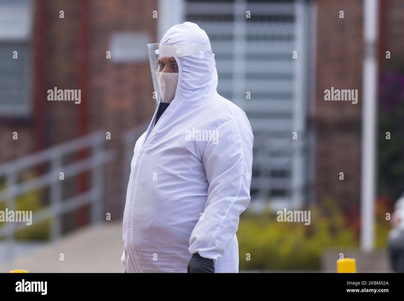 Health professionals wearing biosafety dresses in a Bogota clinic in ...