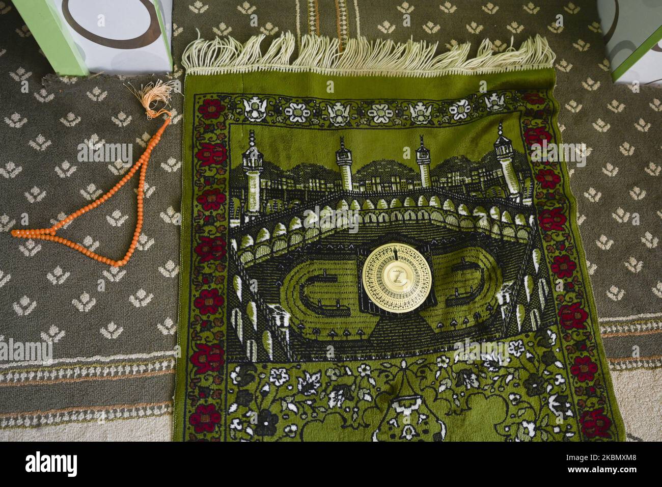 Prayer rug and dial used to calculate the location of mecca in the ...
