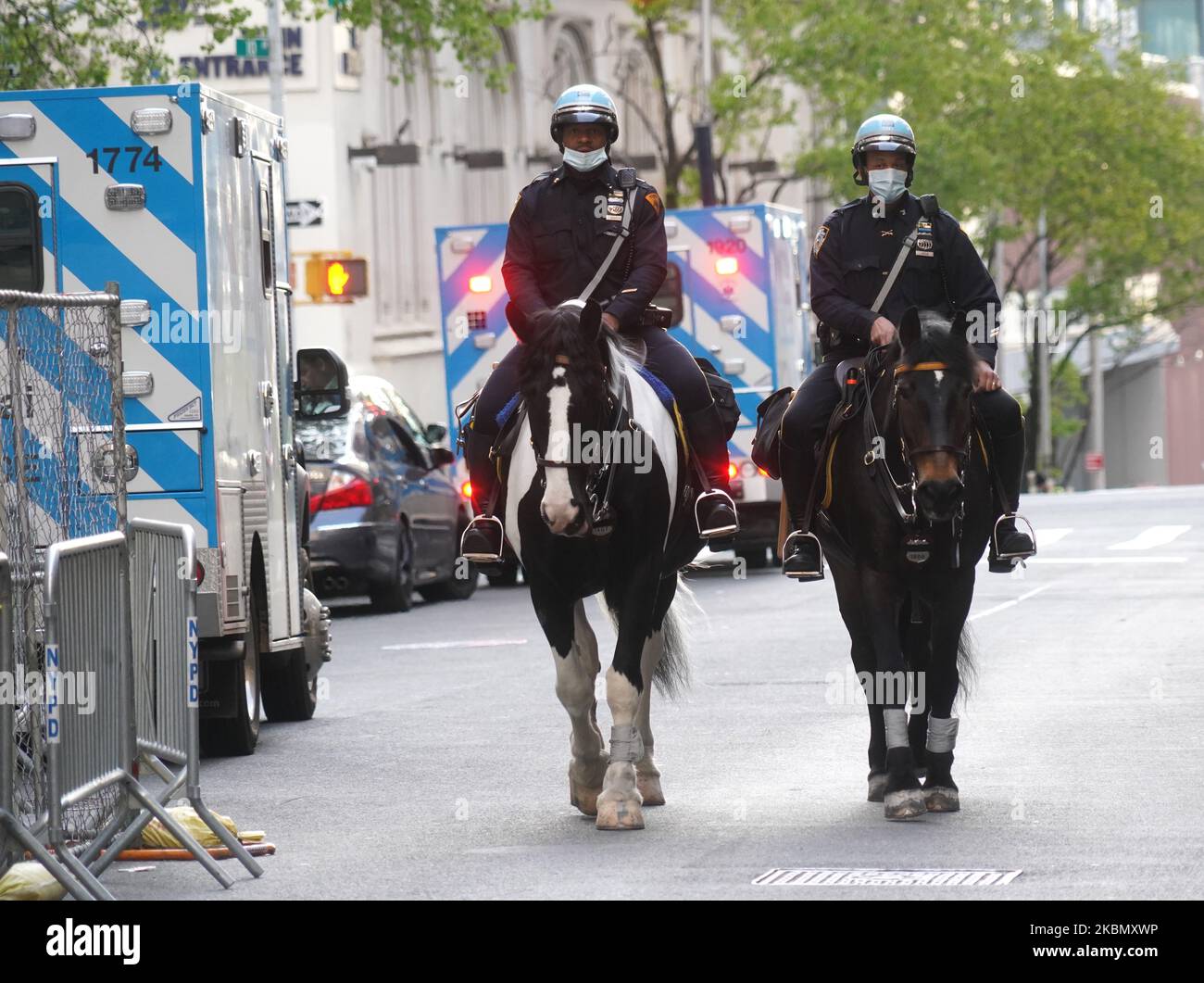 Two police officers from the mounted unit of NYPD are seen near the ...