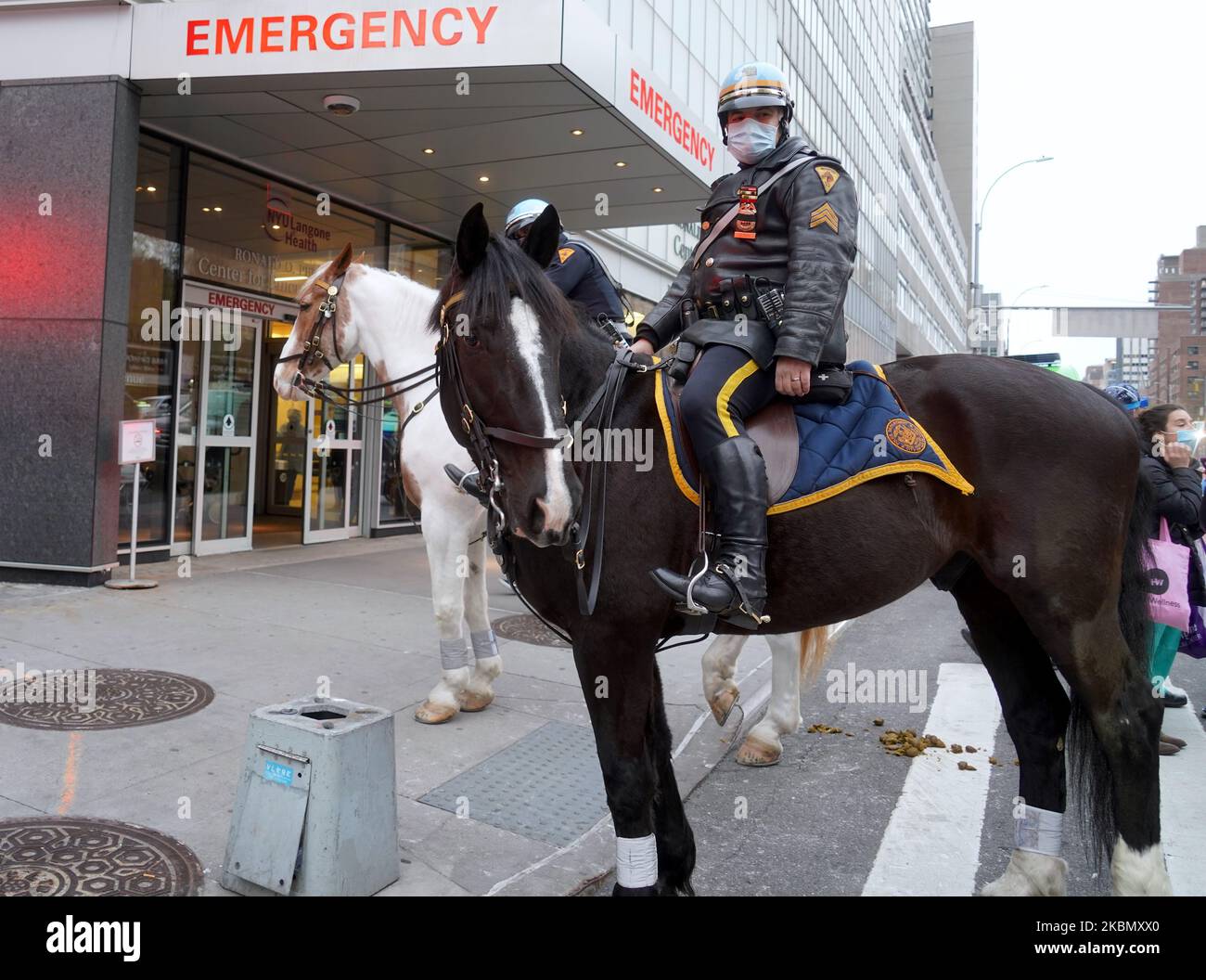 Two police officers from the mounted unit of NYPD are seen near the ...