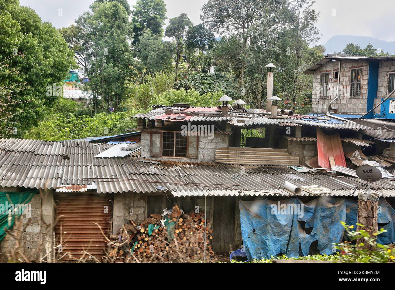 Makeshift homes of cinderblocks and sheet metal in the small village of ...