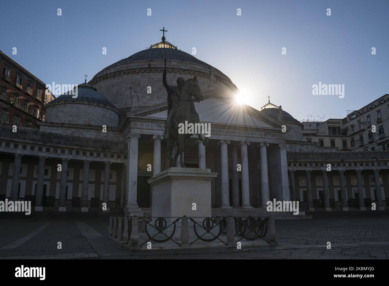 A few people walking in Piazza del Plebiscito, the Neapolitan landmark ...