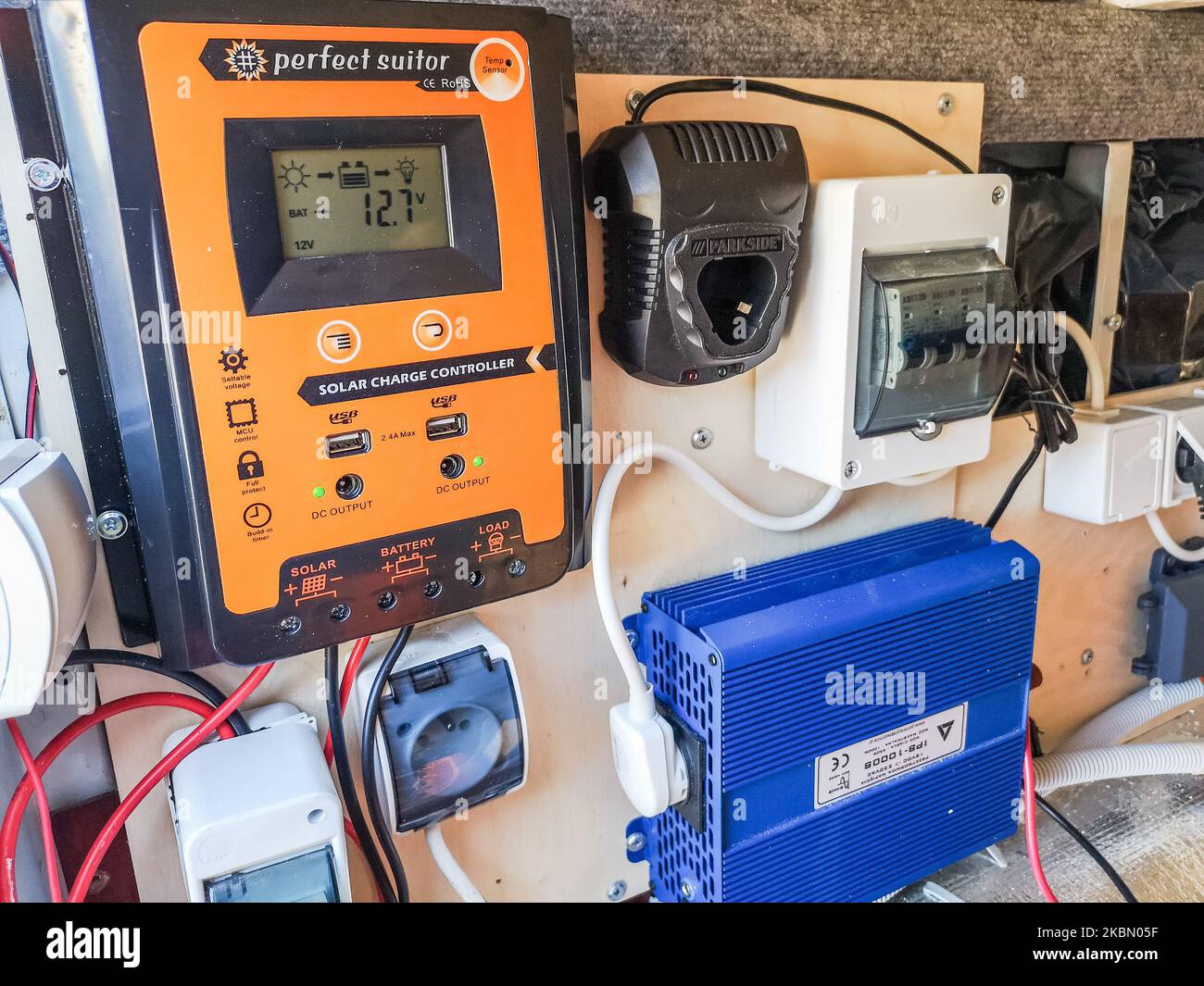 Solar charge controller Perfect Suitor with power inverter mounted in a ...