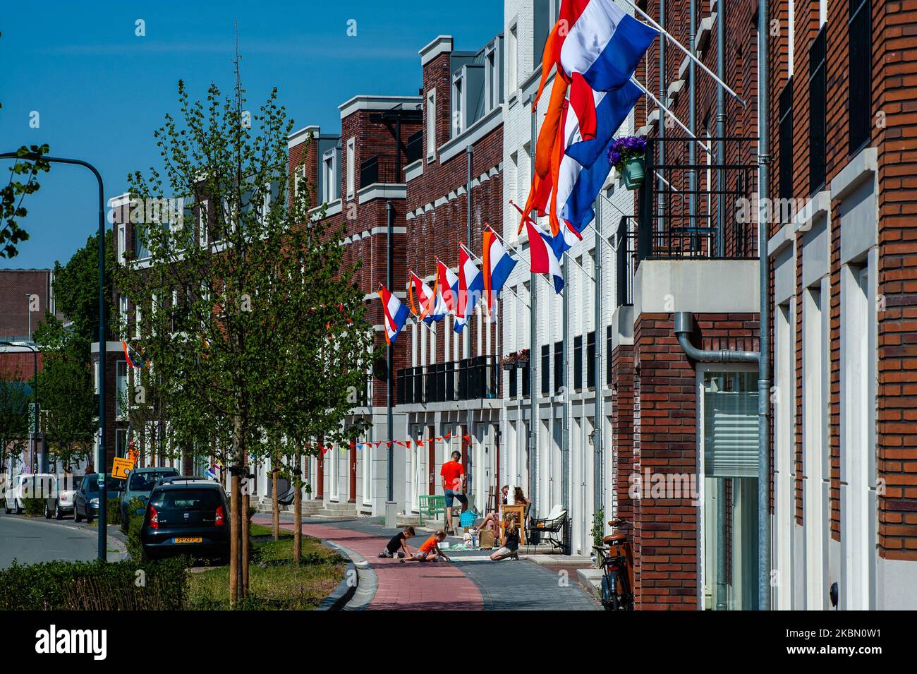 A street in the center of the city is decorated with Dutch flags while ...