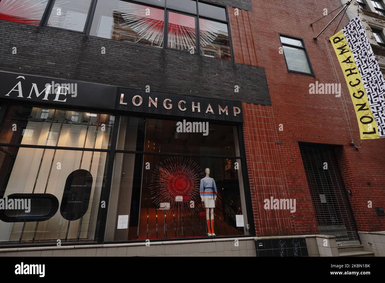 A view of up Longchamp boutique Store in Soho area of New York City USA ...