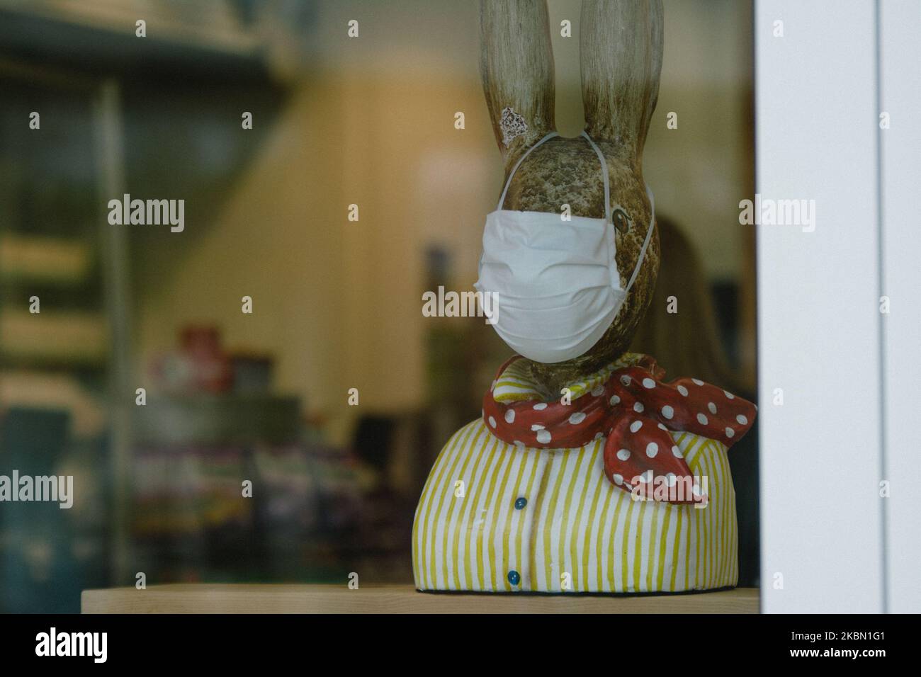 a wooden Rabbit is seen with a face mask in Munster as Germany makes ...