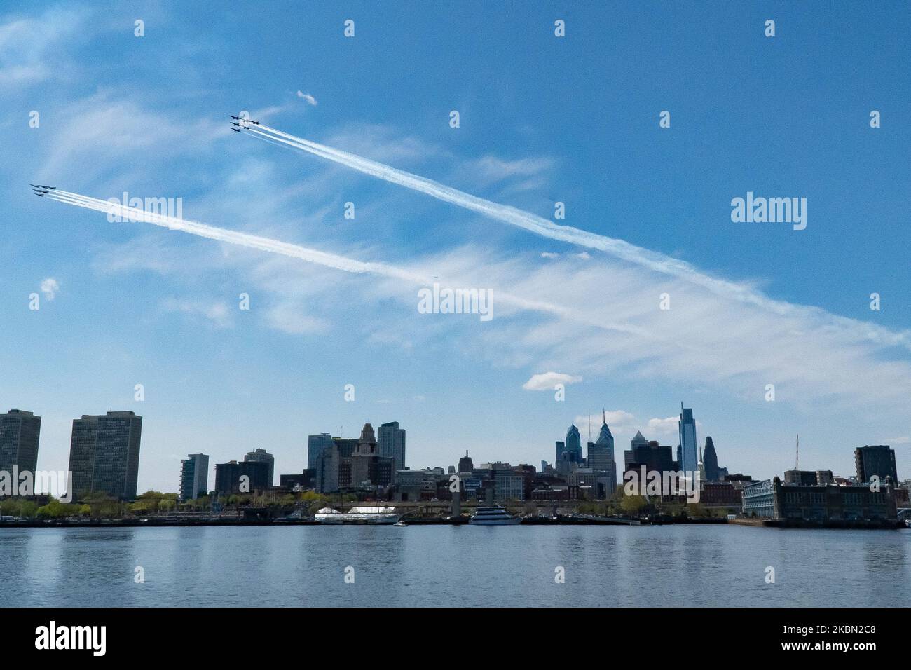 The Navy Blue Angels and Air Force Thunderbirds fly over downtown ...