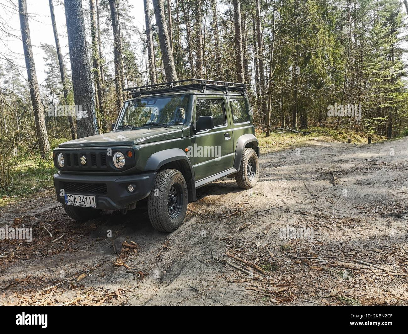 Nato green colored new suzuki jimny 4x4 hi-res stock photography and ...