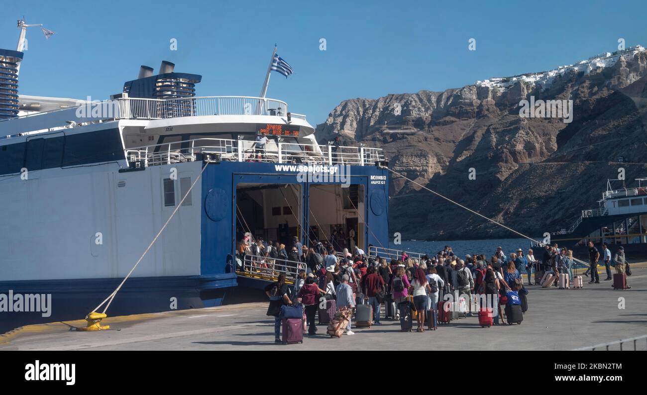 Santorini, Greece. 2022. Passengers boarding a Greek fast ferry from ...