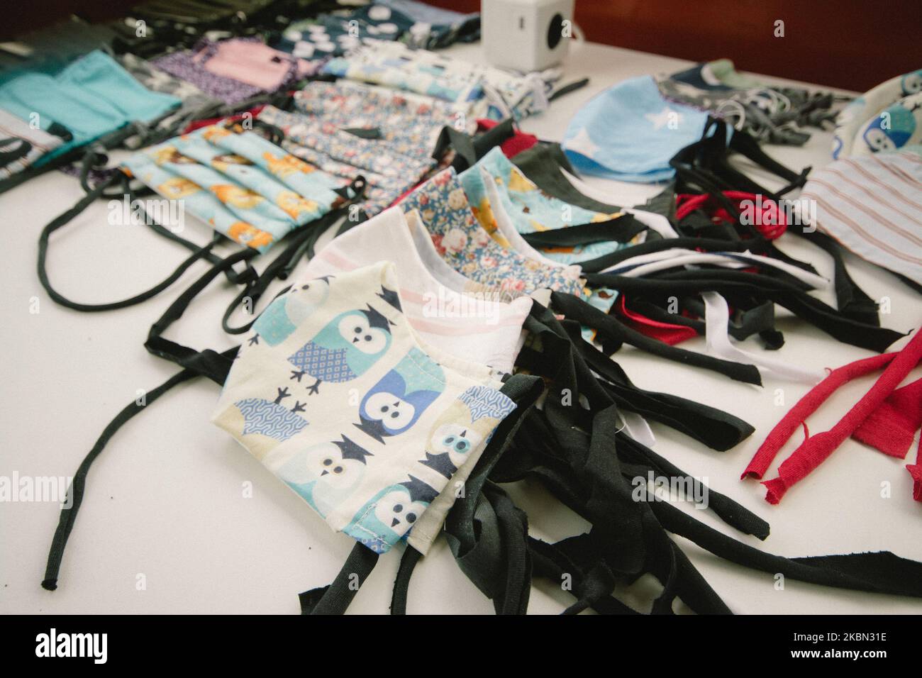 Some of face masks are made by employees and make available in library ...