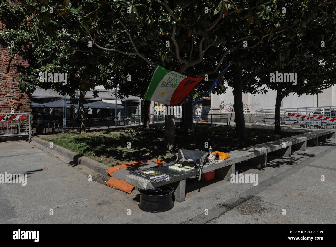 The haunt of a homeless man with the Italian flag in Milan during ...