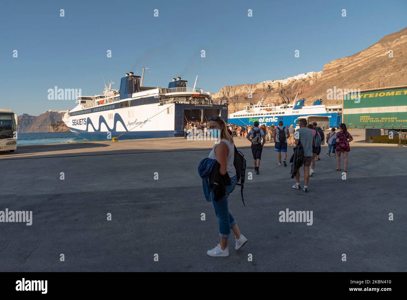Santorini, Greece. 2022. Passengers boarding a Greek fast ferry from ...