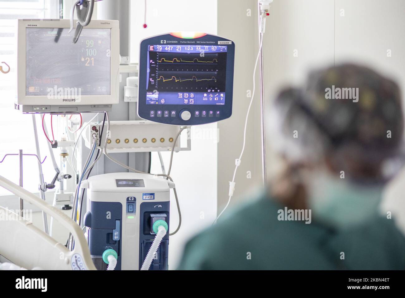 Healthcare personnel attend to a patient admitted to the ICU Intensive ...