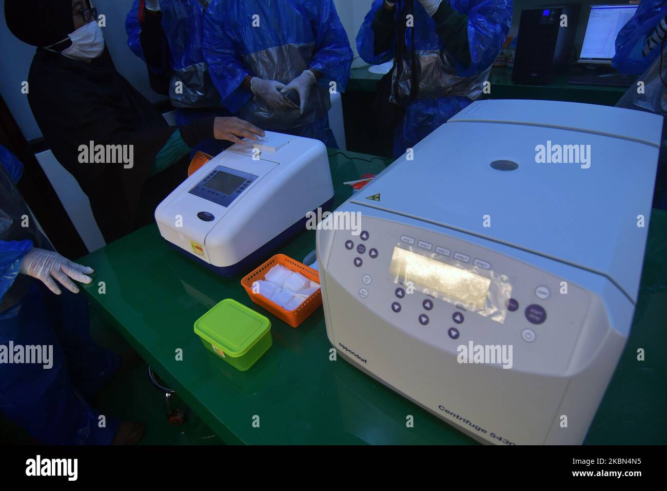 Officers showed COVID-19 swab test equipment at a health laboratory in ...