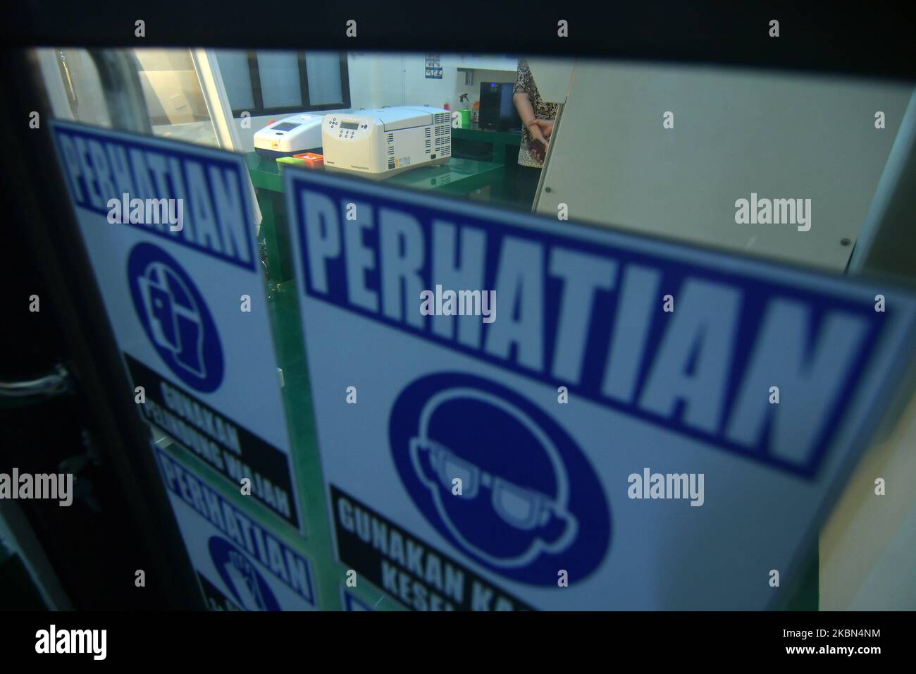 Officers showed COVID-19 swab test equipment at a health laboratory in ...