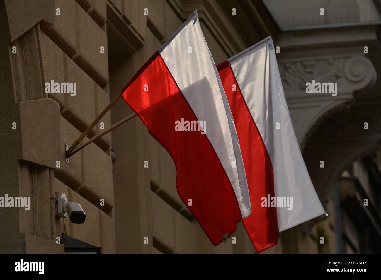 Polish national flags seen in Krakow's city center, on the eve of the ...