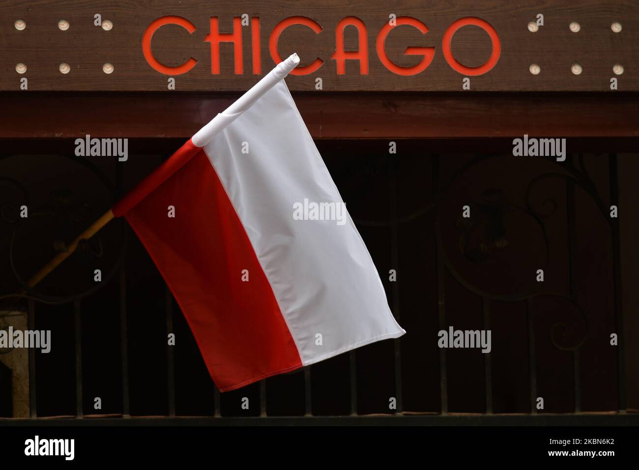 A Polish national flag seen in Krakow's Old Town, on the eve of the ...