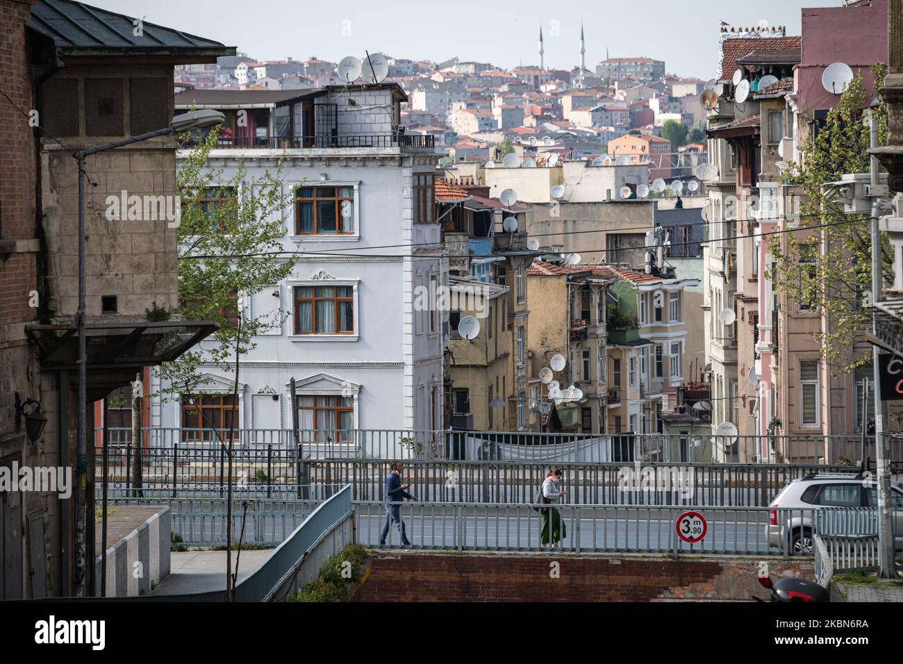 On 29 April, 2020, Turkish pedestrians wearing face masks cross a ...