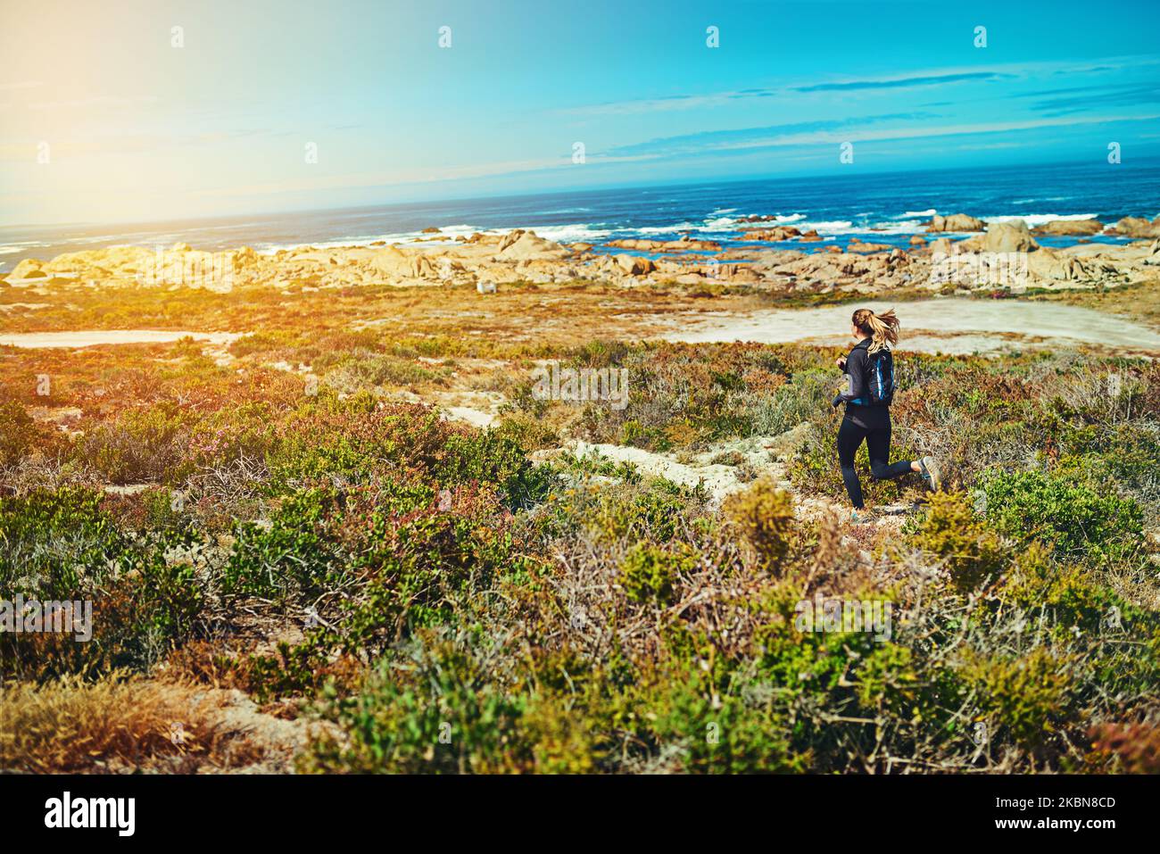 Young blonde woman jogging in hi-res stock photography and images - Alamy