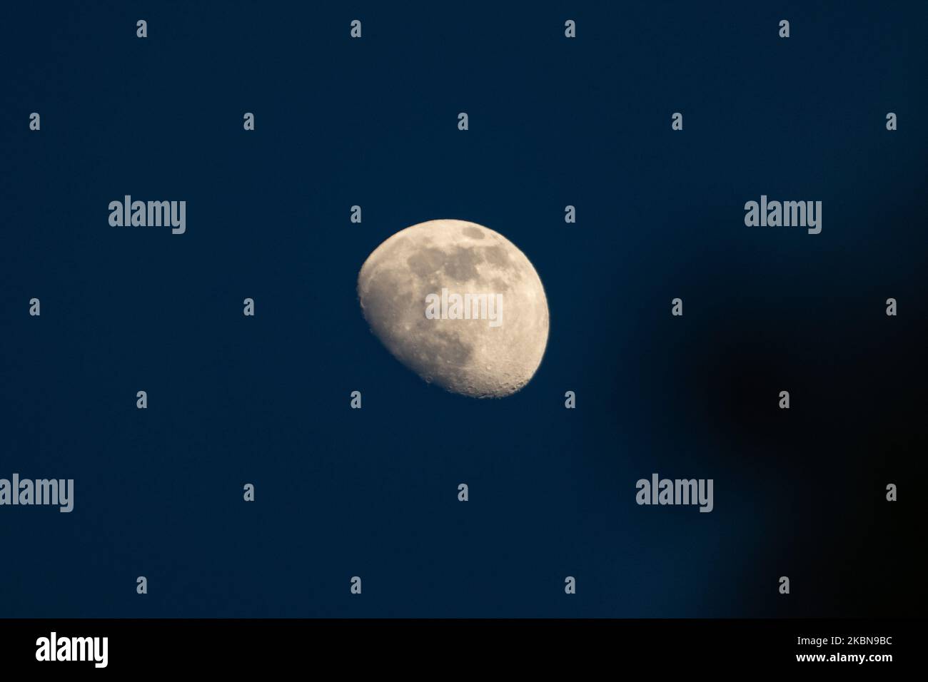 The moon rises over the city of Thessaloniki in Greece. According to ...