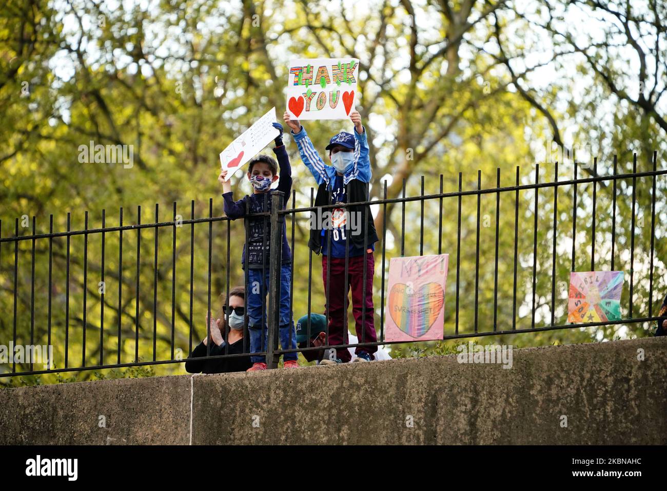 People are seen clapping as a sign of appreciation for medical ...