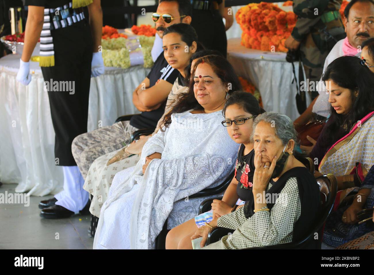 Family members of Colonel. Ashutosh Sharma reacts during the funeral ...
